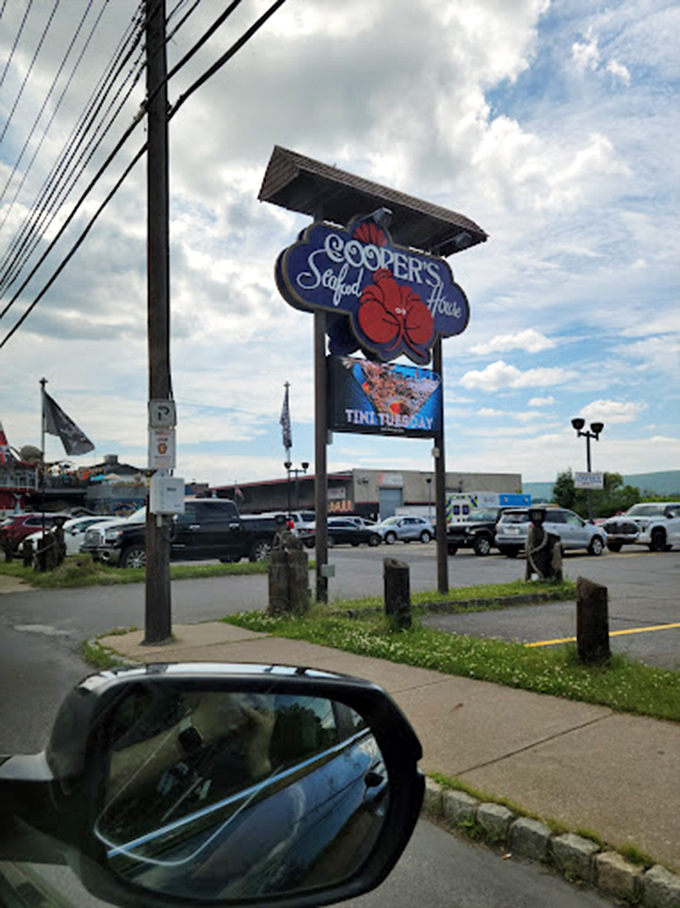 The sign stands tall like a beacon of hope for the seafood-deprived, promising oceanic delights in the heart of coal country.