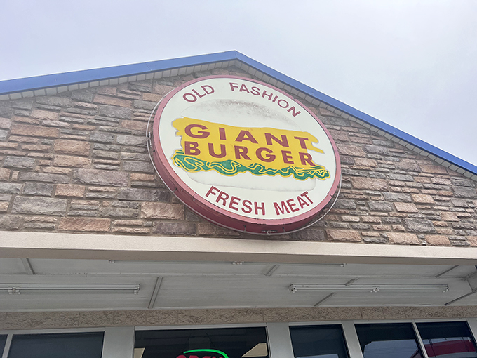 That sign isn't just advertising&mdash;it's a beacon of hope for hungry travelers seeking burger salvation.