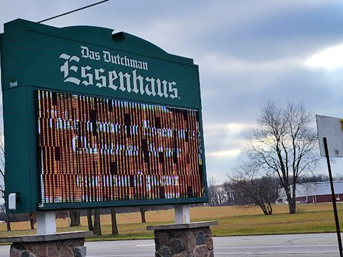 The digital sign outside Das Dutchman Essenhaus: where modern technology meets Amish tradition, like your grandmother finally learning to text but only in all caps.