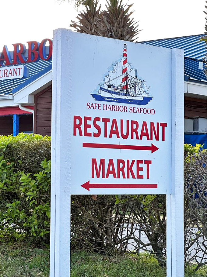 The sign that points the way to paradise. Left for shopping, right for eating, or do both and call it a perfect day.