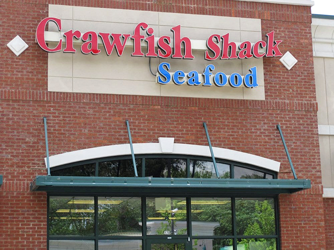 The sign that's launched a thousand detours. Like finding buried treasure in a strip mall—X marks the spot for seafood gold.