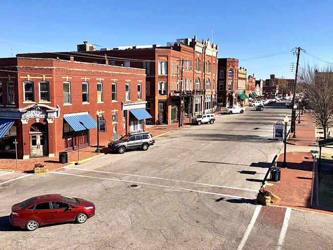 Downtown Guthrie's wide streets were designed for horse-drawn carriages but accommodate modern vehicles with historic views included.