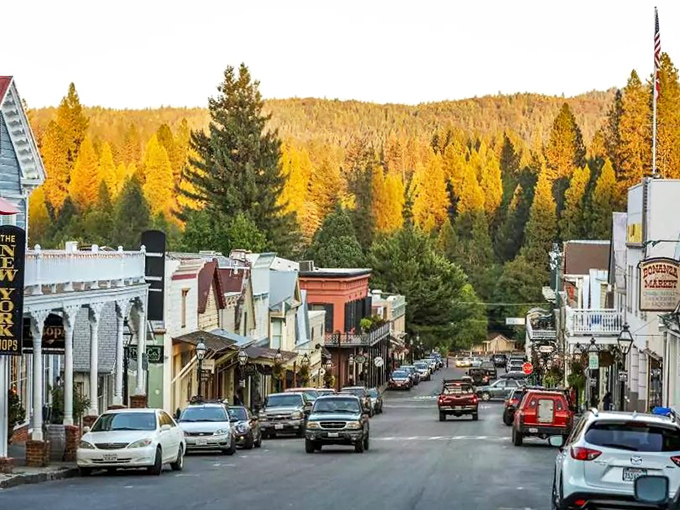 Fall paints the surrounding hills gold while the town nestles below, like a movie set director ordered "more autumn" and nature delivered.