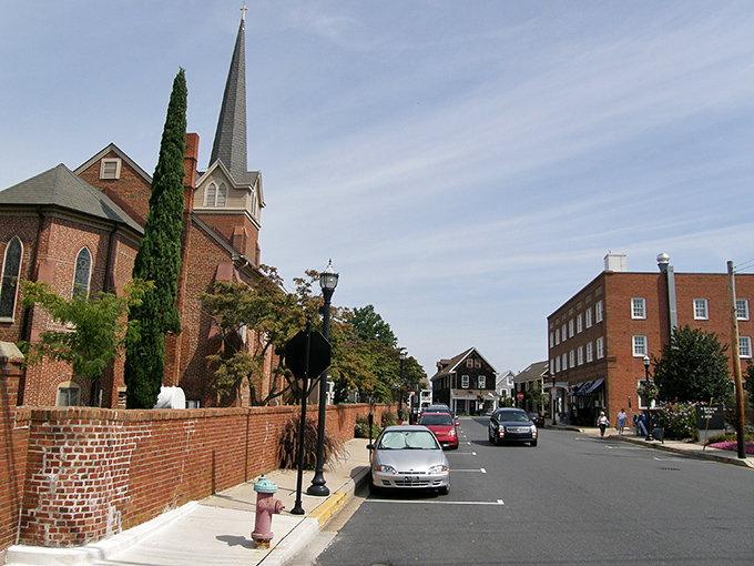 St. Peter's Episcopal Church stands as a brick sentinel along Lewes' historic streets, its steeple reaching skyward since 1858.