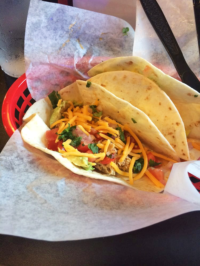 The exposed beam ceiling and spacious interior create the perfect backdrop for the serious business of sandwich appreciation and sports watching.