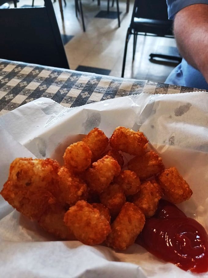 These aren't just tater tots &ndash; they're golden nuggets of potato perfection that somehow make ketchup feel like it's finally met its soulmate.