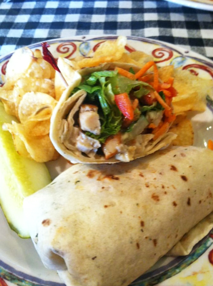 Their wrap platters come with house-made chips and pickle&mdash;proving that lunch can be both satisfying and a perfect prelude to cheesecake.