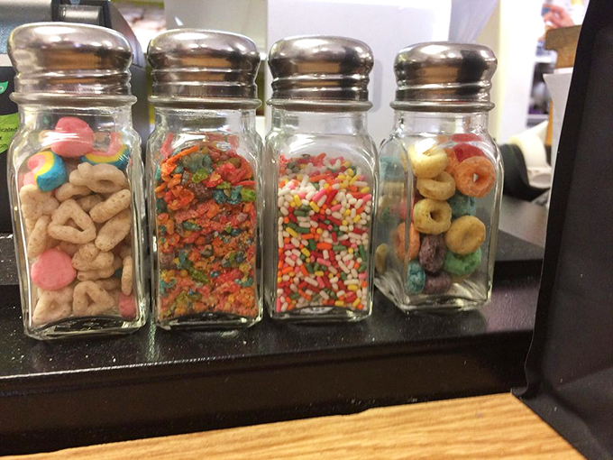 Sprinkle shakers standing at attention, ready to transform ordinary donuts into extraordinary experiences. The magic is in the details.