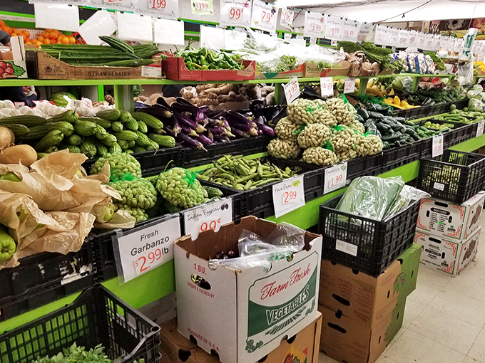 Vegetables arranged with the precision of a still life painting, but priced for everyday cooking. Nature's color palette on practical display.