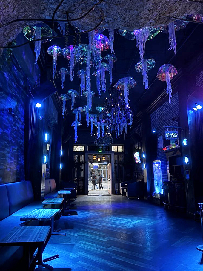 The ethereal blue lighting creates an otherworldly atmosphere that makes everyday worries dissolve like salt in water. Tuesday night never looked so magical.