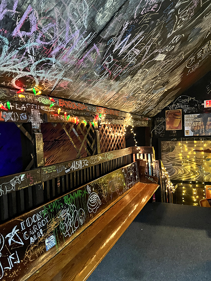 Every inch of wall space tells a story—some written in chalk, others etched in the memories of those who've passed through.