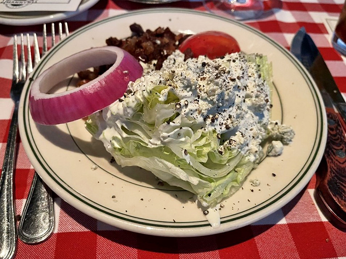 Lettuce entertain you! This wedge salad is a crunchy, creamy masterpiece that proves vegetables can party too. Blue cheese for the win!