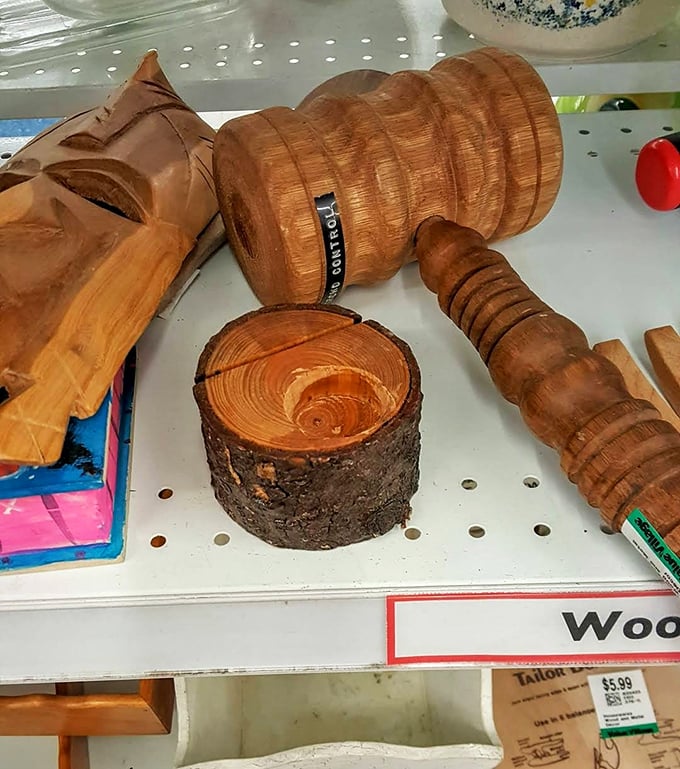 This wooden gavel has definitely seen some action. Was it a judge's, an auctioneer's, or just the most dramatic way to call family meetings?