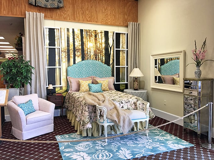 This staged bedroom display proves everything looks better when wrapped, draped, or covered in the right fabric.