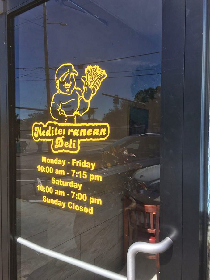 The neon glow of Mediterranean promise &ndash; this illuminated sandwich-wielding fellow has guided hungry souls to flavor salvation since day one.