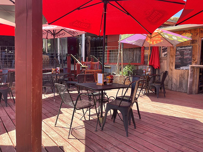 The outdoor patio&mdash;where the high desert air seasons every bite. Red umbrellas provide shade while you contemplate ordering just one more round.