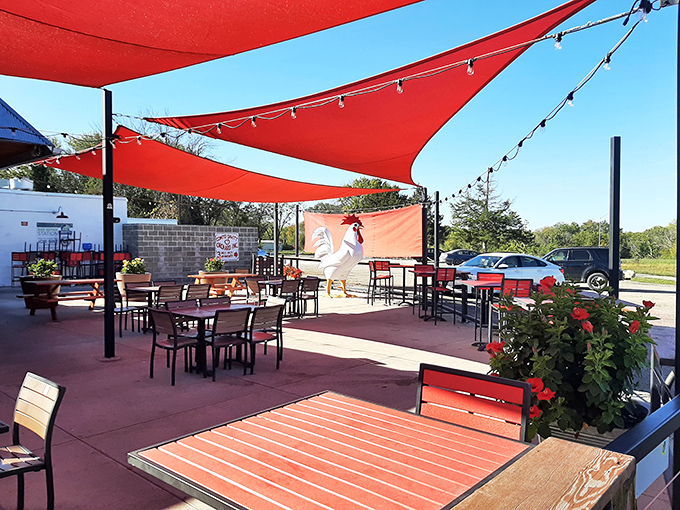 The outdoor patio with those striking red shade sails isn't just a place to eat&mdash;it's where summer memories are made, one crispy bite at a time.