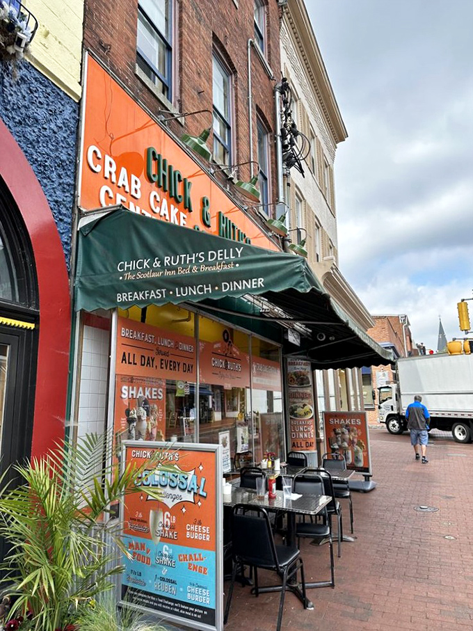 The sidewalk view that's launched a thousand food pilgrimages. That green awning has sheltered generations of hungry Marylanders from rain and FOMO.