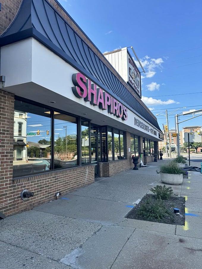 The storefront stands proud, like the sandwich sentinel of Indianapolis. Those pink letters have guided more hungry pilgrims than any GPS ever could.