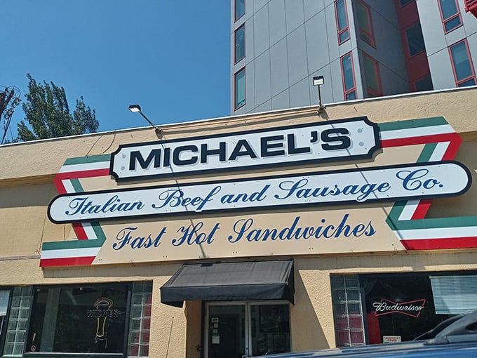 The sign promises "Fast Hot Sandwiches" but doesn't mention the slow-cooked perfection inside. Chicago's gift to Portland stands proud.