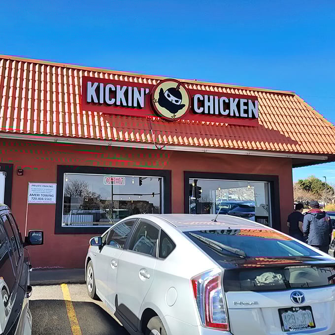 On sunny Colorado days, this terracotta-colored chicken temple beckons with promises of crispy, juicy delights that justify any detour.