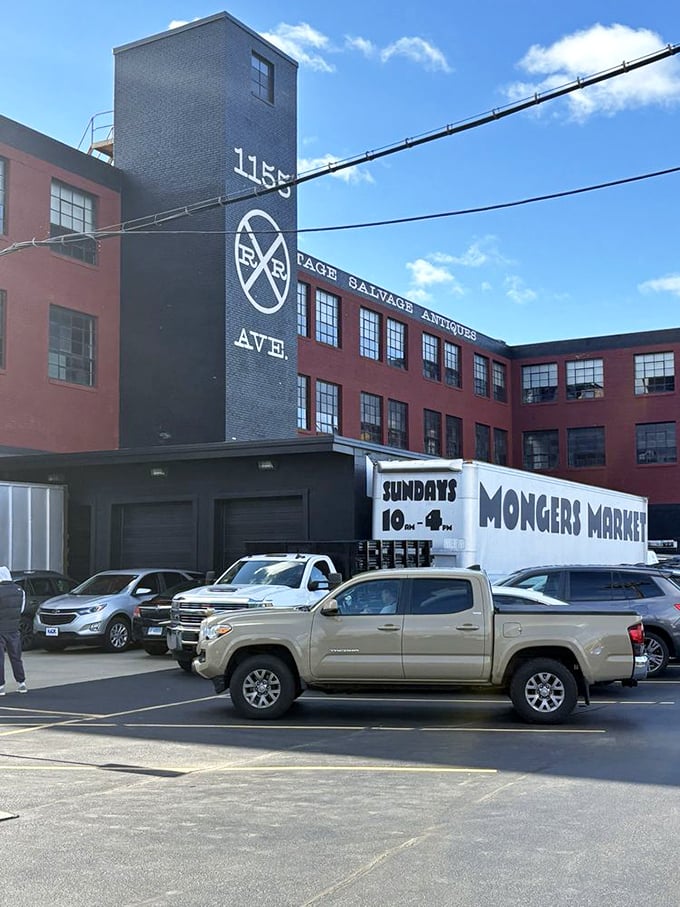 "VINTAGE SALVAGE ANTIQUES" boldly proclaims the building's purpose, with that black smokestack standing like an exclamation point on Bridgeport's skyline.