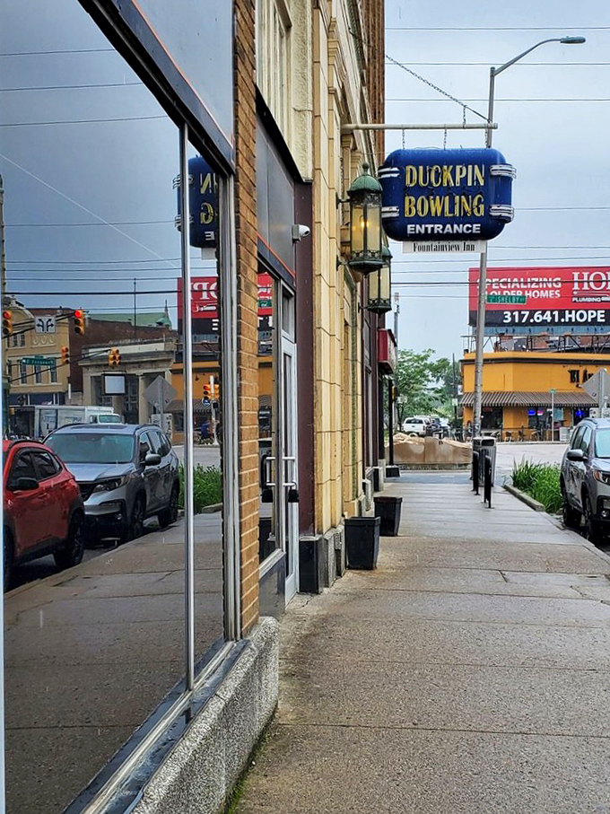 The iconic blue sign serves as a beacon for those seeking entertainment with history, character, and zero pretension.