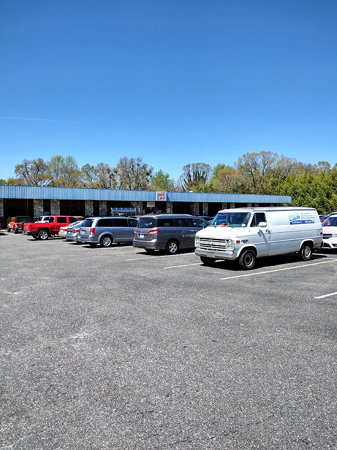 The expansive parking lot fills with vehicles from every walk of life&mdash;a testament to bowling's universal appeal as America's great social equalizer.