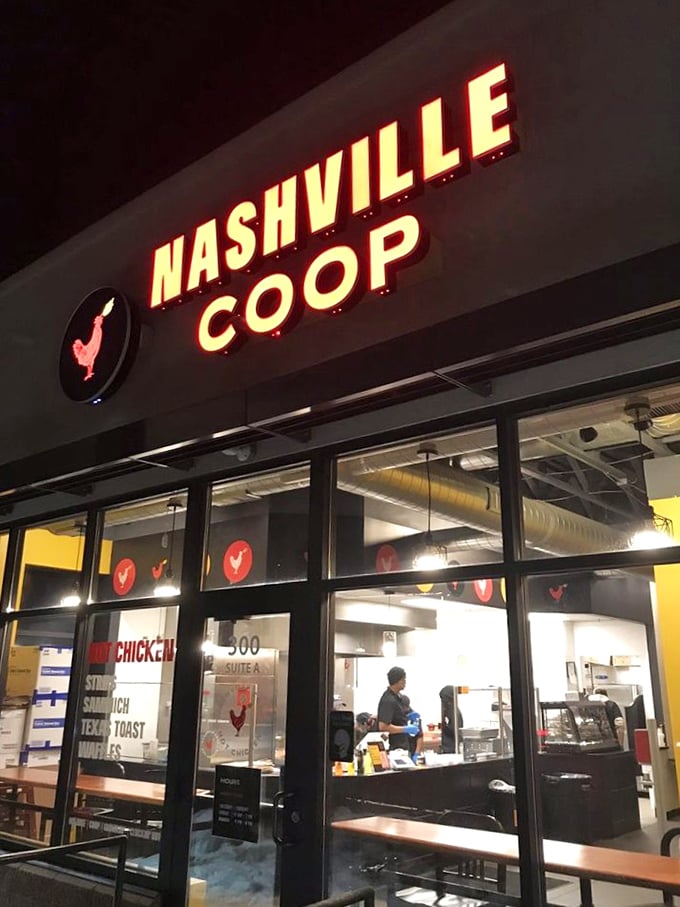 As night falls, the Nashville Coop sign transforms into a lighthouse for the spice-seeking souls of St. Paul. Follow the glow to your flavor destiny.