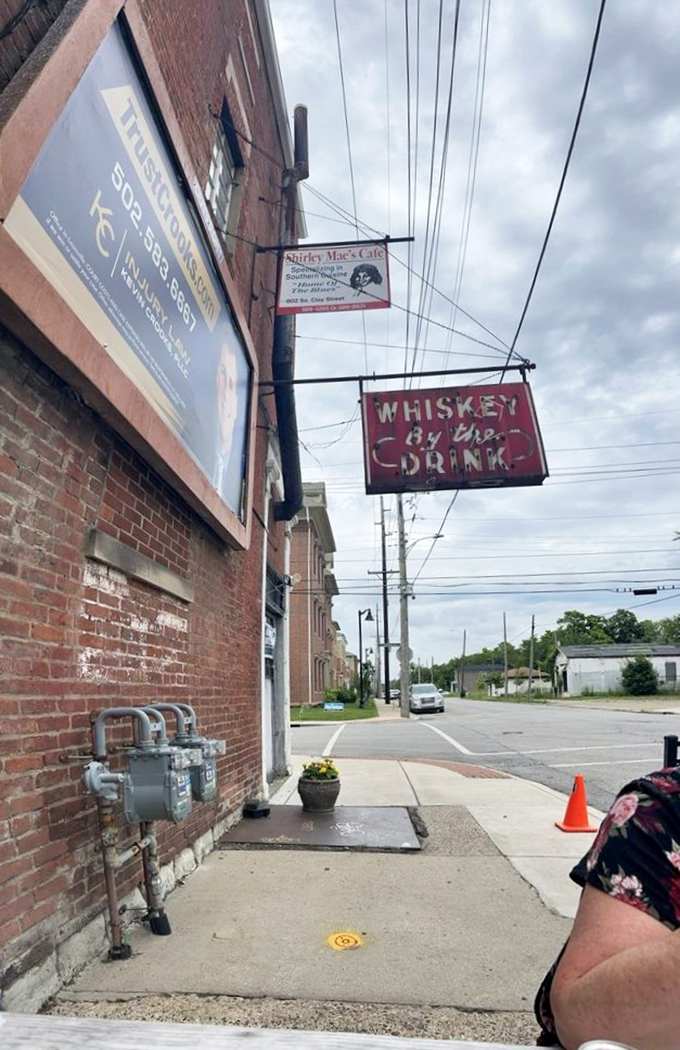 The view from the sidewalk doesn't hint at the culinary wonderland within&mdash;just a vintage "Whiskey by the Drink" sign promising good times ahead.