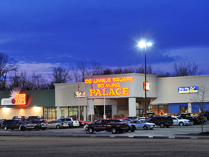 As dusk falls, the Palace's neon glow becomes a beacon for those seeking the satisfying crack of pins and cold beverages.