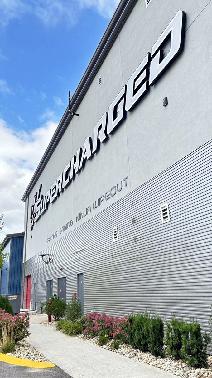 Architectural ambition meets family fun. The massive exterior hardly contains the decibels of joy and competitive trash-talking happening inside.