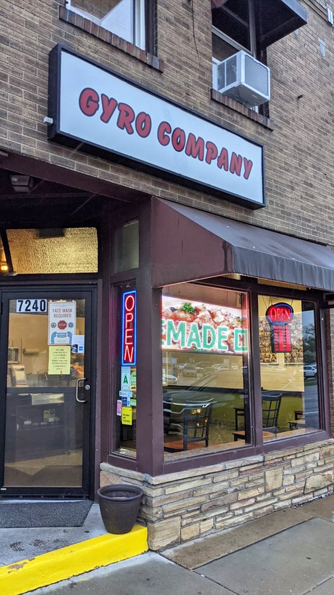 A beacon of Mediterranean flavor in the heart of Missouri. That neon "OPEN" sign might as well say "TASTE PARADISE HERE."