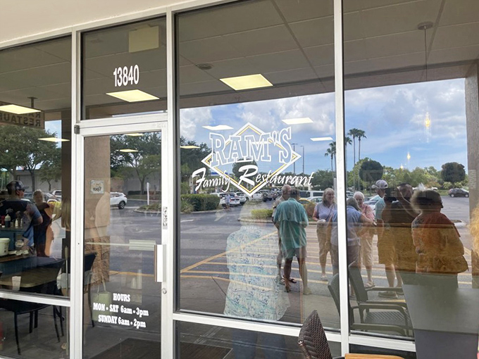 The welcoming entrance to Ram's, where the logo promises and the food delivers&mdash;a true Florida hidden gem hiding in plain sight.