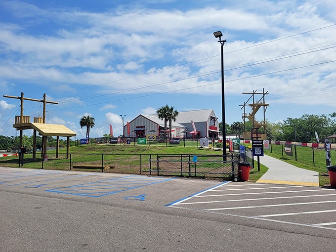 The approach to adrenaline central. That parking lot has seen countless arrivals of skeptics and departures of newly-converted racing enthusiasts.