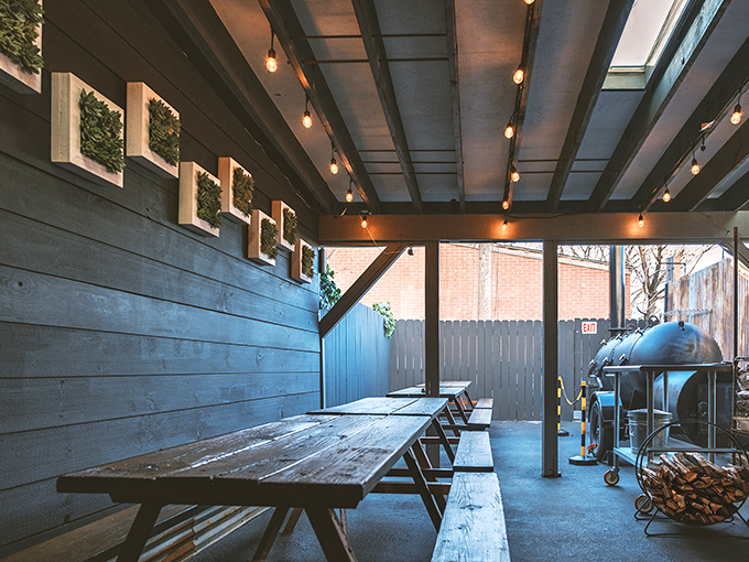 Outdoor seating that feels like you've been invited to the coolest backyard party in town. String lights included.