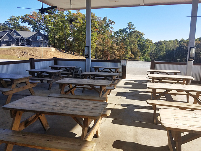 The outdoor seating area offers a breath of fresh air between bites, with picnic tables that have witnessed countless barbecue epiphanies.