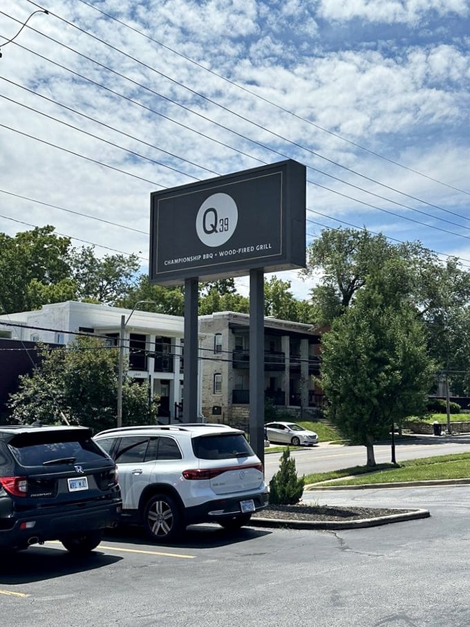 The Q39 sign stands tall against Kansas skies, a beacon of hope for the hungry and a landmark for those who worship at the altar of smoke.