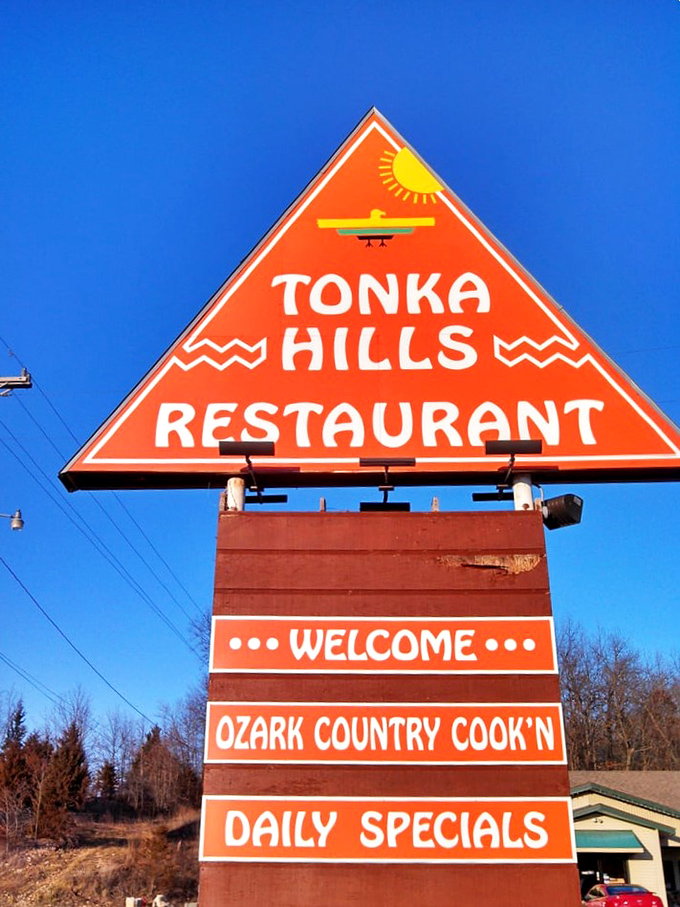 Like a beacon guiding hungry travelers, Tonka Hills' iconic sign promises "Ozark Country Cook'n"&mdash;possibly the three most beautiful words in the English language.