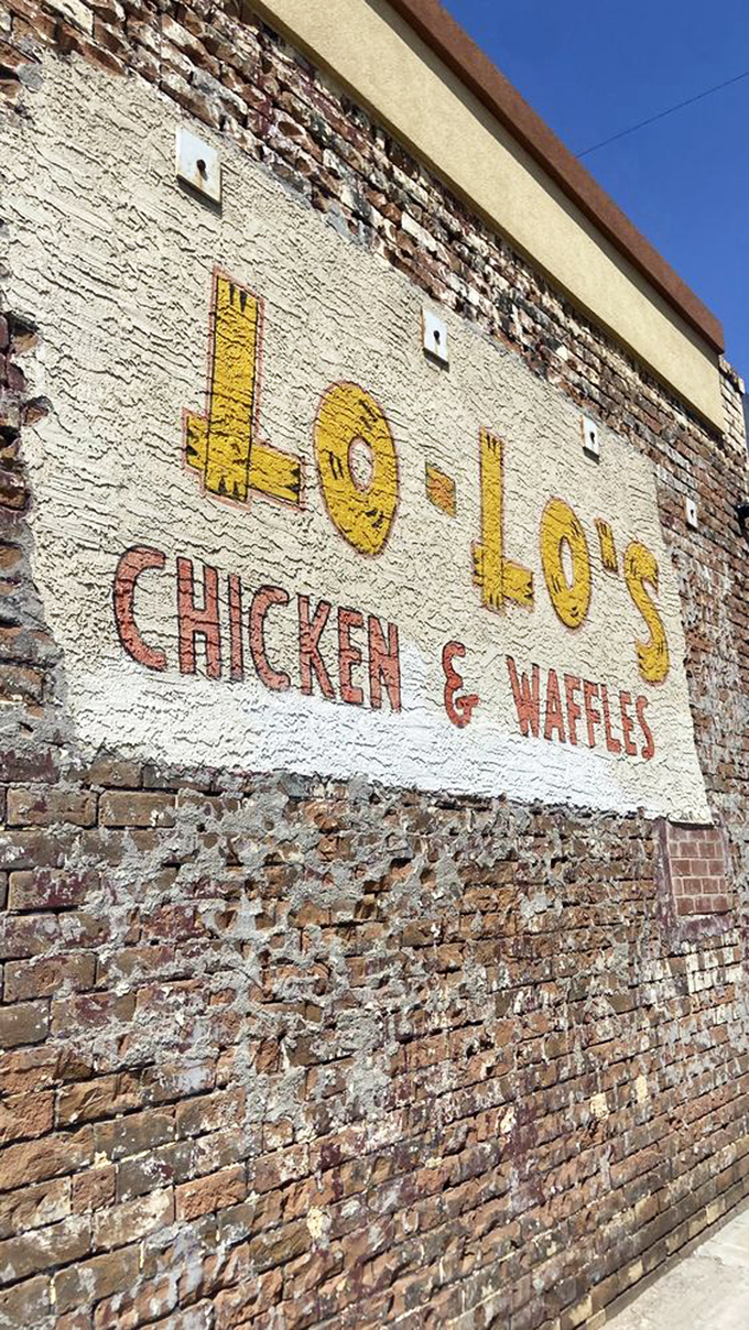 The writing's on the wall: Lo-Lo's isn't just a restaurant name, it's a promise of what awaits inside these hallowed brick walls.