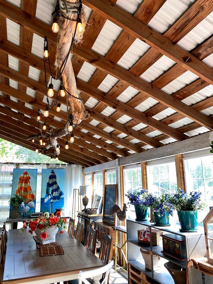 String lights dance across reclaimed beams, creating the perfect backdrop for long conversations about which vintage find deserves to come home.