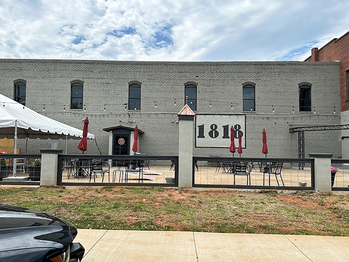 Where history meets hops in perfect harmony. 1818 Brewing Company's outdoor space invites you to sip locally crafted beers in a historic setting.