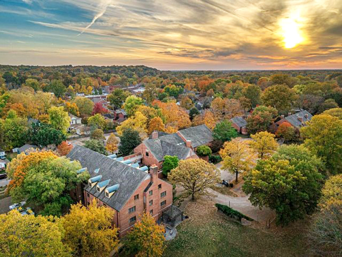 Autumn transforms New Harmony into a tapestry of gold and crimson, revealing the town's perfect layout from above like a living historical diorama.