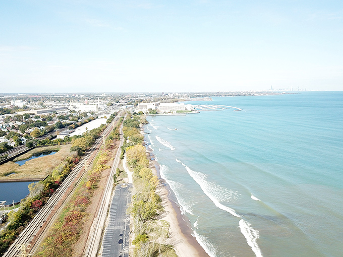 Whiting's waterfront wonderland from above. This aerial view reveals how seamlessly the natural beauty of Lake Michigan embraces the community and its recreational treasures.