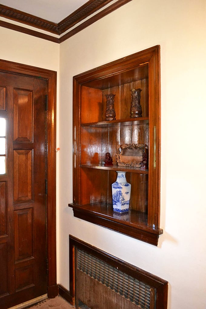 Built-in display niches throughout the castle showcase treasures and keepsakes, turning everyday corners into museum-worthy vignettes.