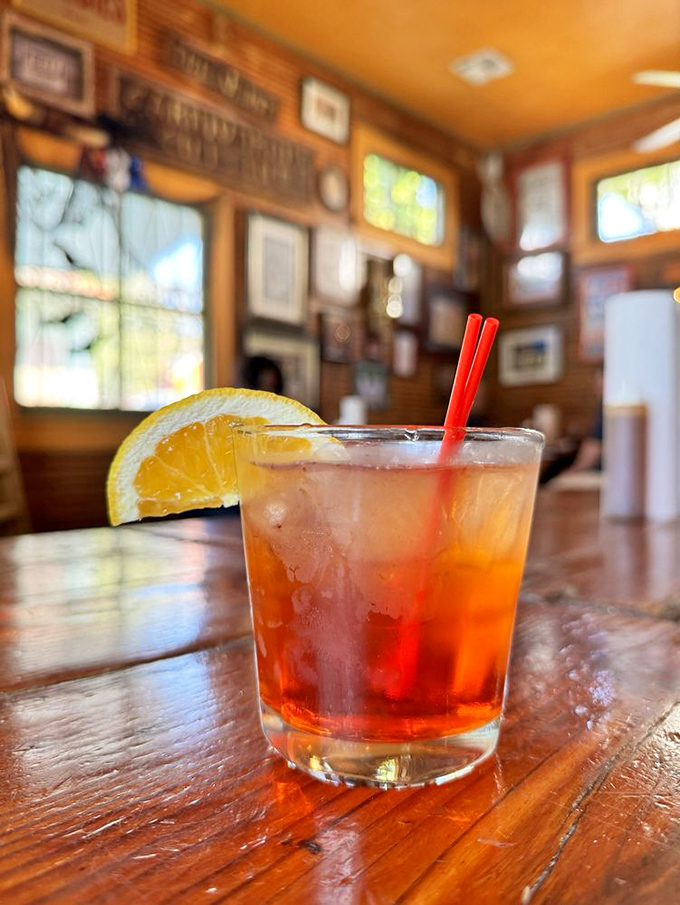 Like finding an oasis after a delicious barbecue journey, this perfectly crafted cocktail with an orange slice brings balance to the universe.