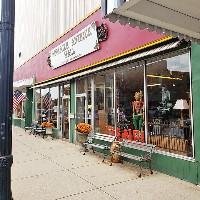 Auglaize Antique Mall welcomes treasure hunters with sidewalk benches and seasonal decorations&mdash;because browsing for history should never be rushed.