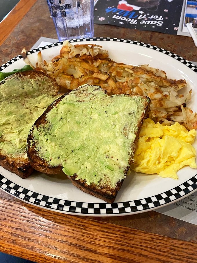 Avocado toast that doesn't require a second mortgage, served with eggs and hash browns that make "breakfast for dinner" a brilliant decision.