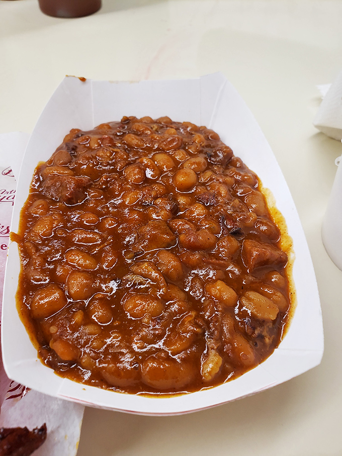 These beans have clearly been to finishing school&mdash;educated in the fine art of absorbing smoke, spice, and whatever delicious meat morsels fell in along the way.