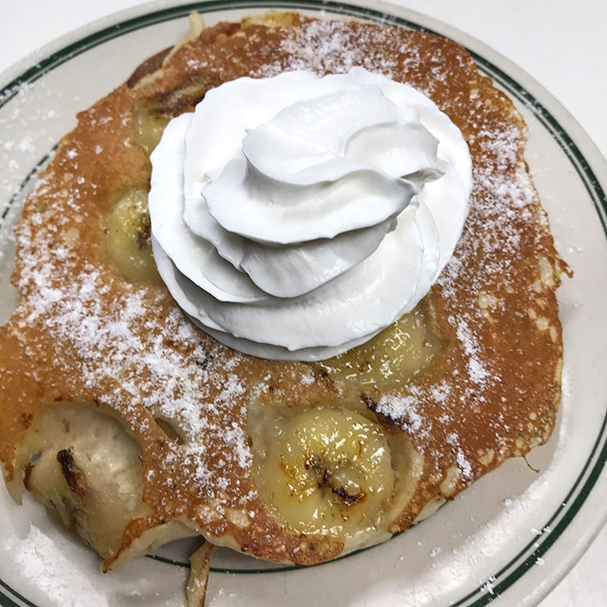 A banana pancake topped with whipped cream isn't breakfast&mdash;it's dessert with an alibi, and we're all willing accomplices.
